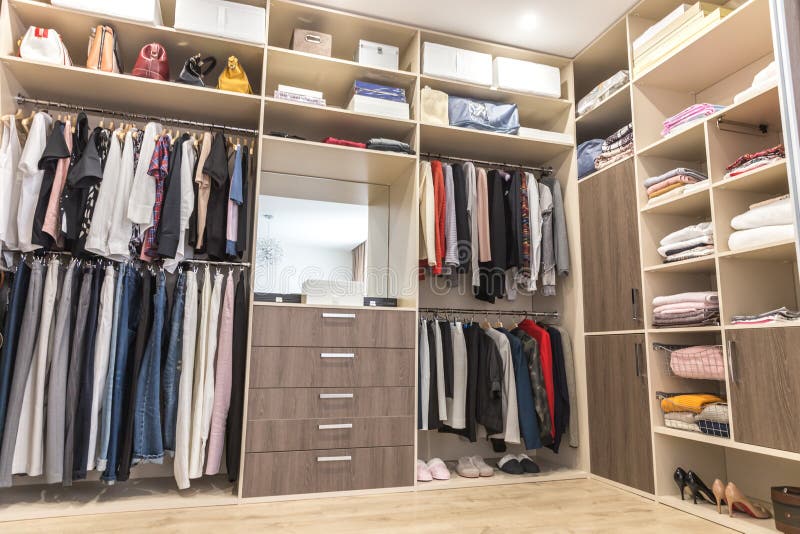 Big Wardrobe with Different Clothes for Dressing Room Stock Photo ...