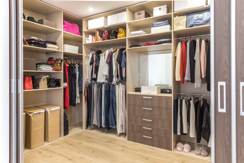 Big Wardrobe with Different Clothes for Dressing Room Stock Photo ...