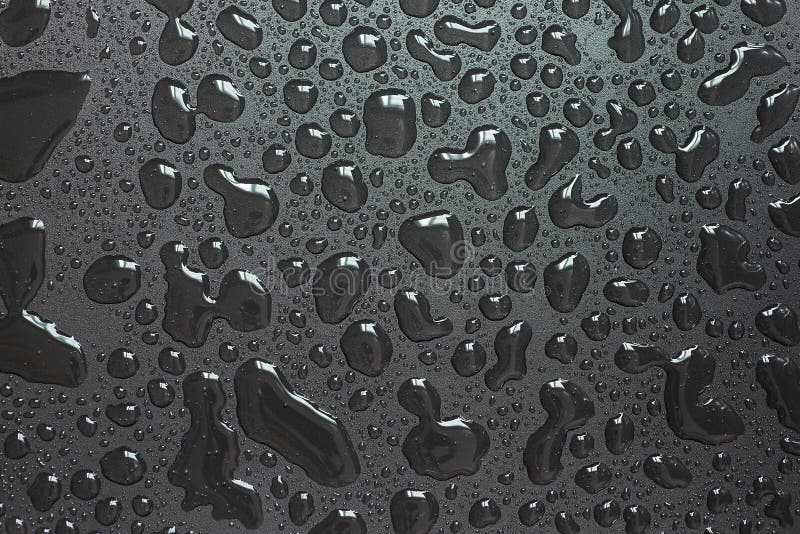 Big Water Droplets Abstract Shape on a Black Background Stock Image ...