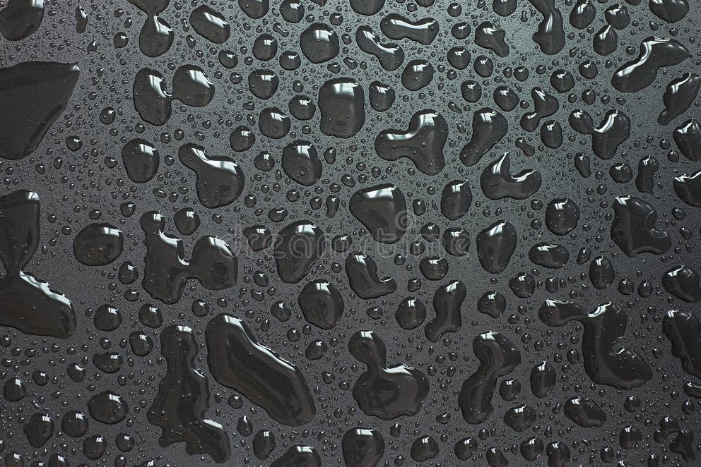 Big Water Droplets Abstract Shape on a Black Background Stock Image ...