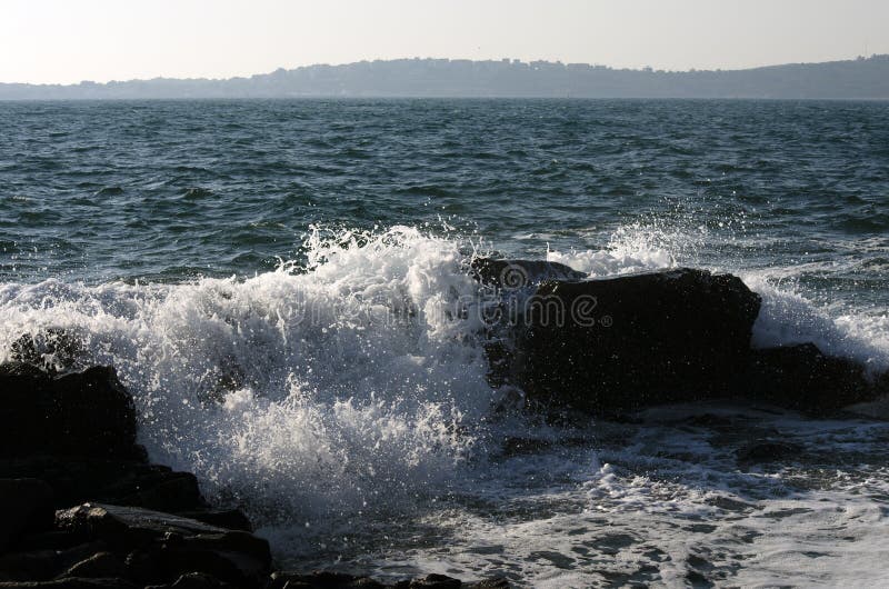 Big Wave Breaks on Rocks of the Beach Stock Photo - Image of waves ...