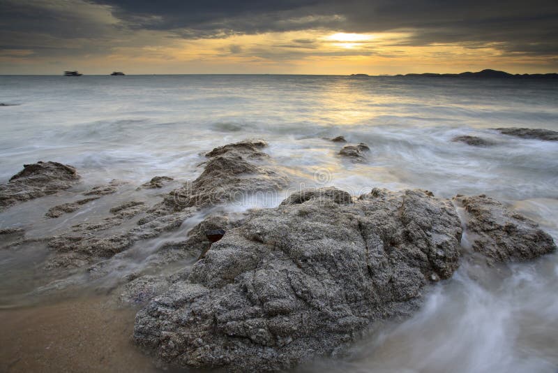 Big Wave and the Rock with Sunset Sky Stock Image - Image of stormy ...