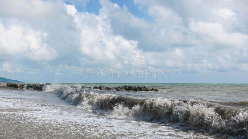 Big Wave Rolls on Rocky Beach Stock Image - Image of coast, storm: 61128223