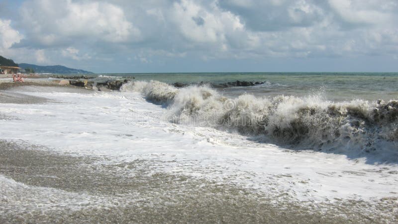 Big Wave Rolls on Rocky Beach Stock Photo - Image of rocks, shelter ...