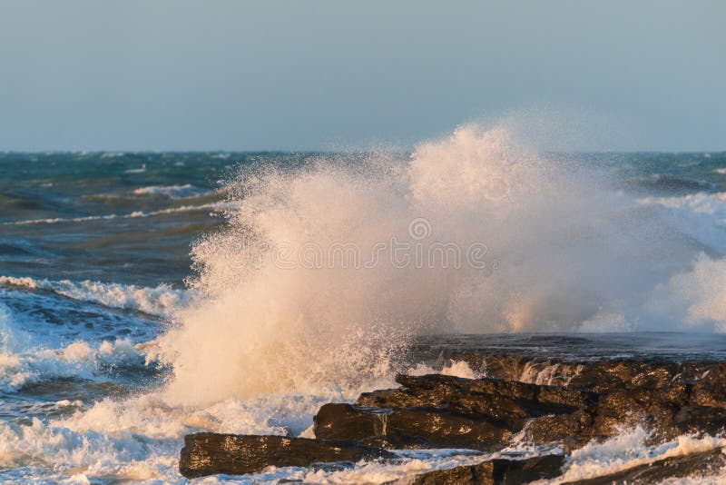 Big Waves Crash Against Coastal Cliffs. Sea Storm Stock Photo - Image ...