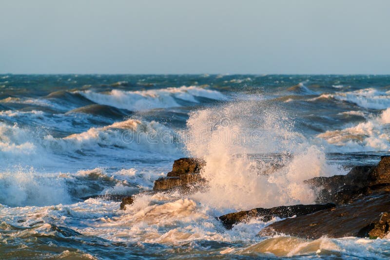 Big Waves Crash Against Coastal Cliffs. Sea Storm Stock Image - Image ...