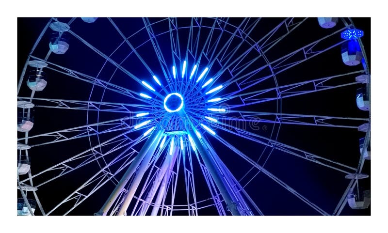 A Big Wheel at Night with Its Blue Color Stock Image - Image of blue ...