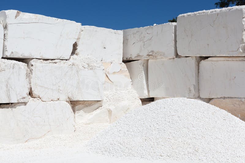 Big White Blocks of Raw Marble from a Quarry Stock Photo - Image of ...