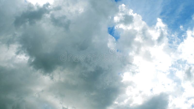 Big White Dramatic Fluffy Clouds in the Blue Sky on Sunny Light. Stock ...