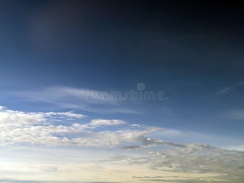 Big White Fluffy Clouds on a Blue Sky with Fine Whispy Lines Stock ...