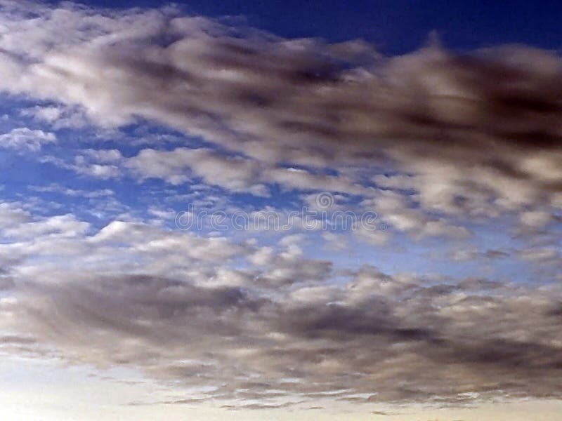 Big White Fluffy Clouds on a Blue Sky with Fine Whispy Lines Stock ...