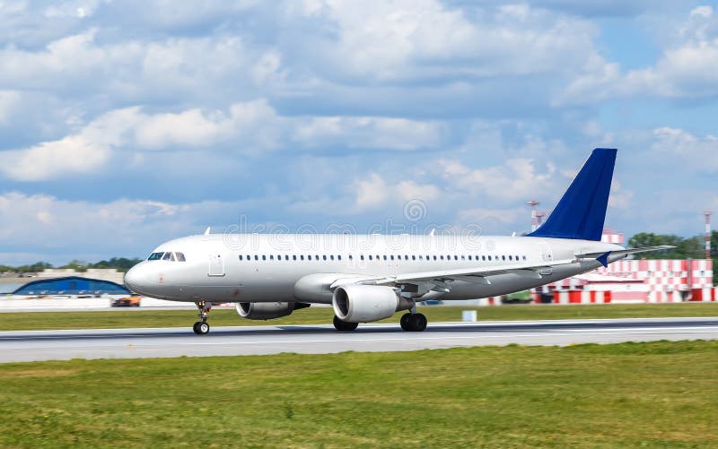Big White Passenger Jet Plane on Runway at Airport a Sunny Day Stock ...