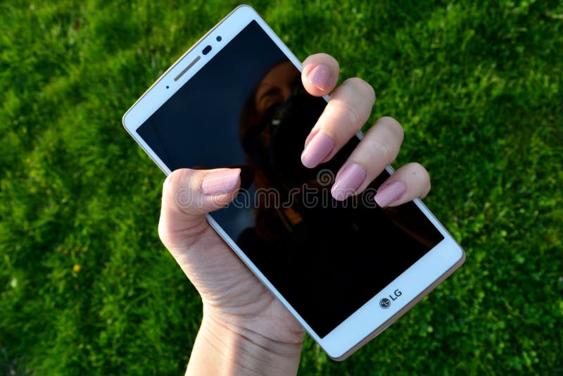 Big white smart phone LG editorial photo. Image of media - 90897156