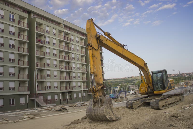 Mini Excavator Digging Up a Electrical Cables from Trench 3 Stock Photo ...