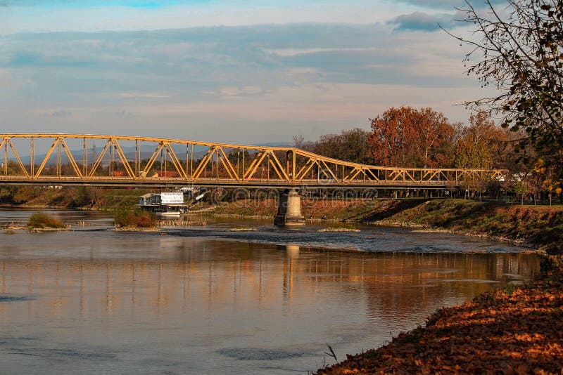Big Yellow Bridge on the River Stock Photo - Image of skye ...