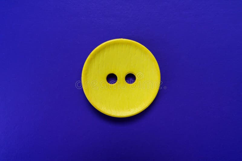 Big Yellow Button Isolated on a Blue Background. Stock Image - Image of ...