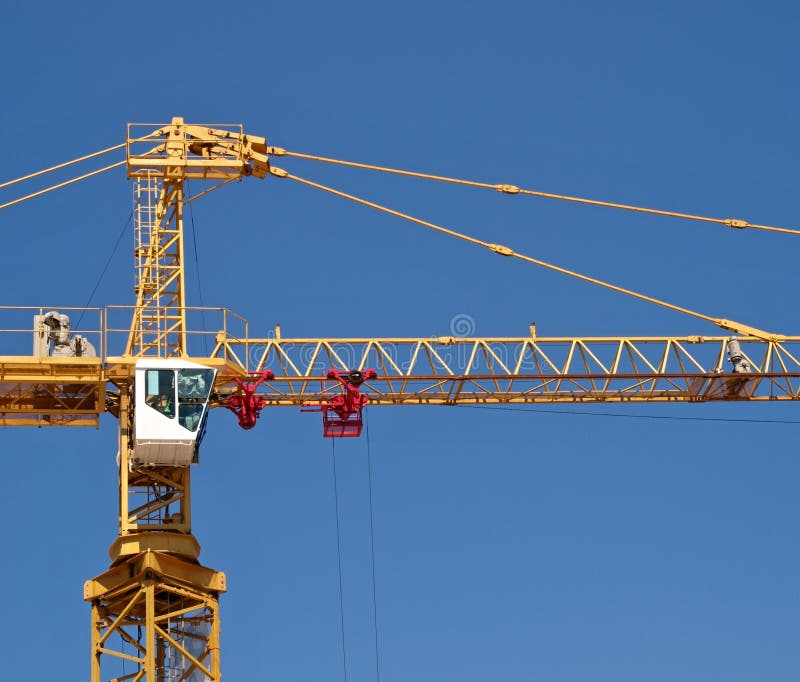 Big Yellow Construction Crane in Front of Blue Sky Stock Photo - Image ...