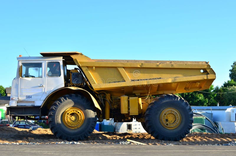 Big Yellow Dump Truck Working on the Construction Site Stock Image ...