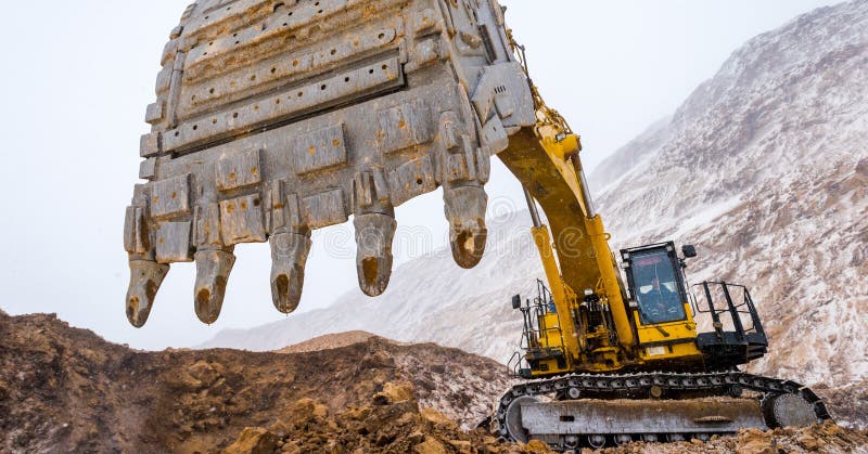 Big yellow excavator stock image. Image of digging, excavate - 86636373