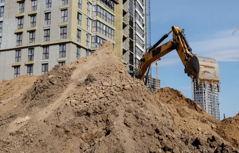 Big yellow excavator stock image. Image of earthmover - 313015099