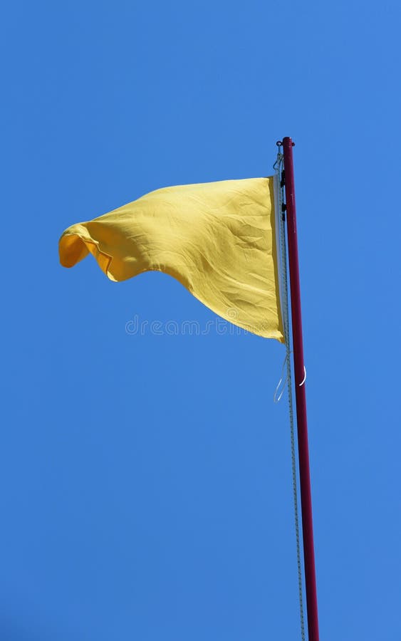 Big Yellow Flag Symbol of Danger of Warning Stock Image - Image of pole ...