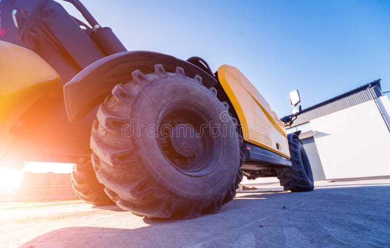Big Yellow Forklift Loader Working Near Warehouse Stock Image - Image ...