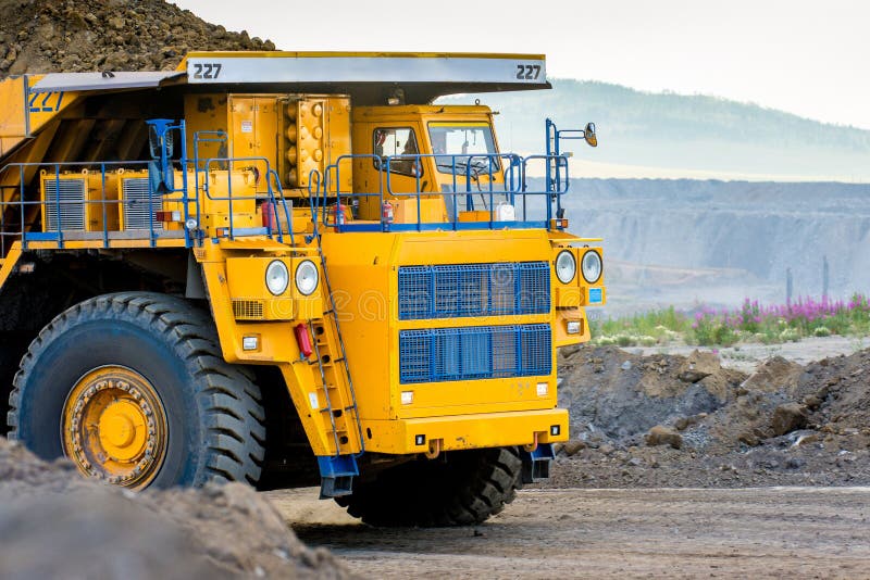 Big yellow mining truck editorial photography. Image of ecology - 73830312