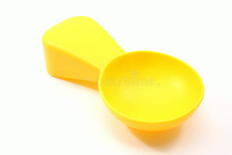 Big yellow scoop spoon stock image. Image of food, utensil - 13633333