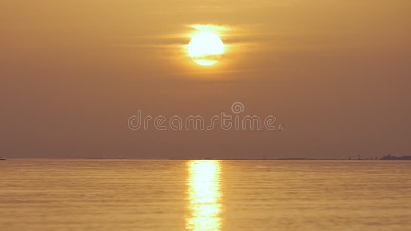 Big Yellow Sun Rising Over Sea Surface Stock Footage - Video of ...
