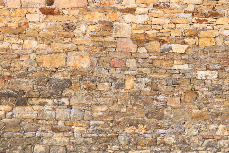 Big Yellow Wall from Stone Bricks Stock Photo - Image of material, gold ...