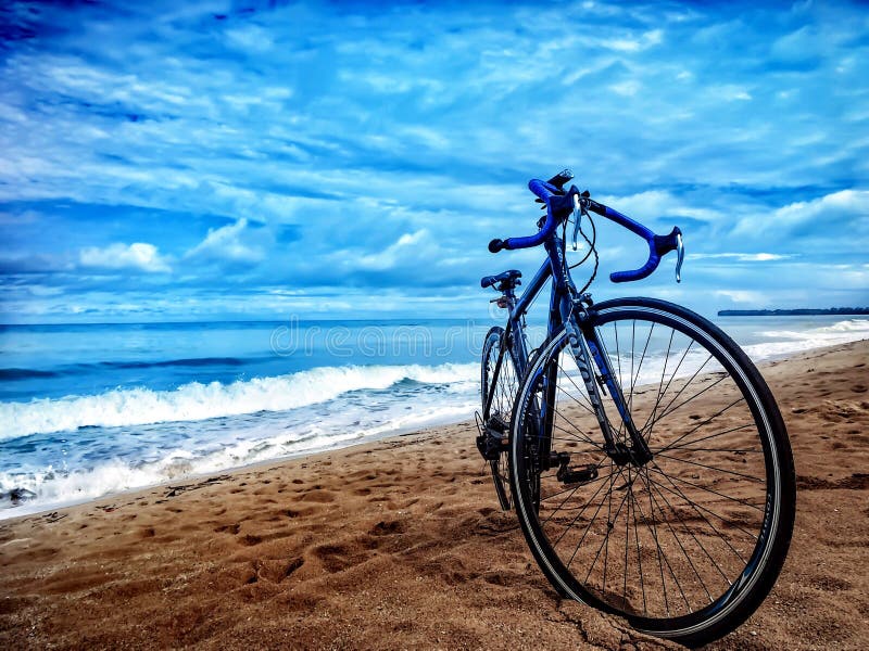 Bike on the beach editorial stock photo. Image of cycling - 59213798