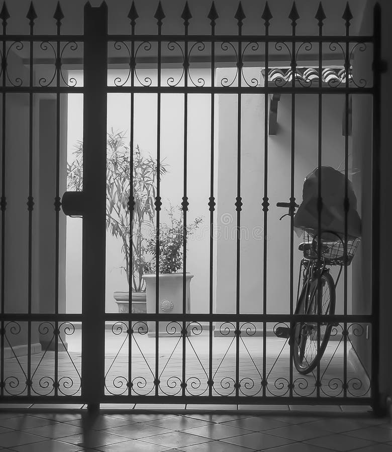 Bike Behind a Closed Gate after Shopping. Stock Image - Image of green ...