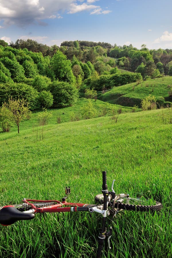 Bike with hills landscape stock image. Image of grass - 10284701