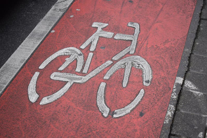 Red bike lane stock photo. Image of sign, wall, ground - 350709378