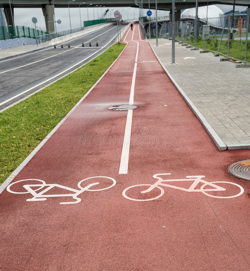 Bicycle Path, Red Marking Of The Bike Lane, Symbol And Direction Stock ...