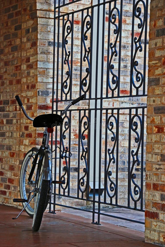 A Bike Lock on a Metal Gate Stock Image - Image of building, bike: 6977169