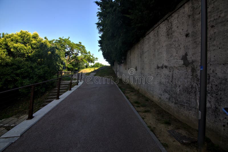 Bike Path in an Italian Town at Sunset Stock Photo - Image of altitude ...