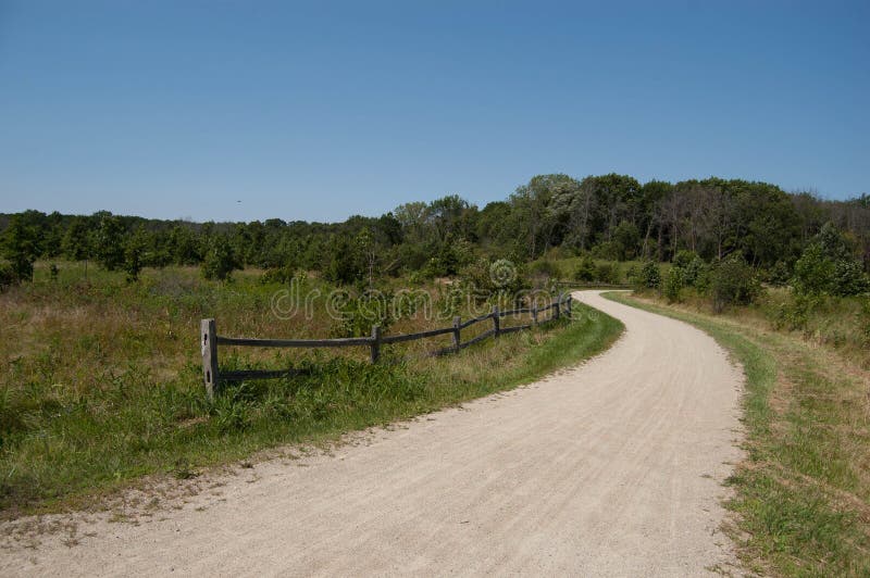 Bike Path in Summer with Rustic Fence Stock Photo - Image of path, bike ...