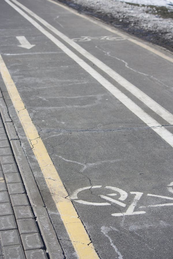 Bike Pattern and Direction of Travel Stock Photo - Image of asphalt ...