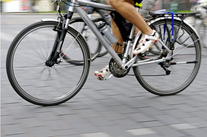 Bike rider on the street stock image. Image of blur, color - 26902621