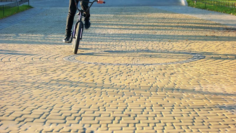 Bike Riding on Cobblestone Pavement. Stock Video - Video of leisure ...