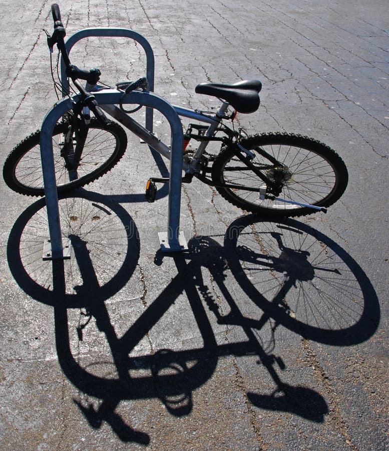 Bike and Shadow stock photo. Image of seat, lock, wheels - 3323362
