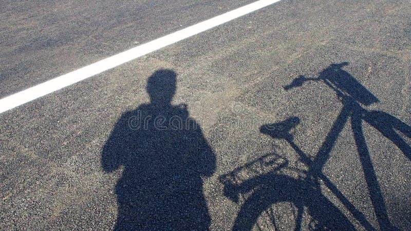 Bike Silhouette and Shadow, Bike Shadow on Asphalt Road Stock Footage ...