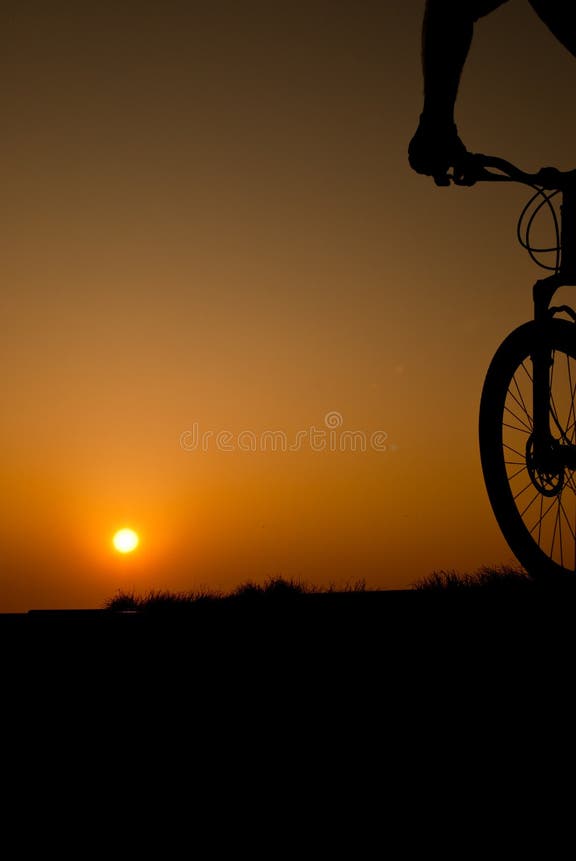 Bike at sunset stock photo. Image of active, beach, orange - 9643482