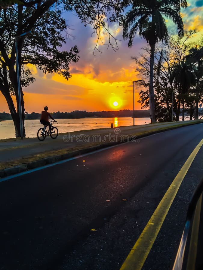 Bike sunset stock image. Image of bike, sunset, ride - 261470243