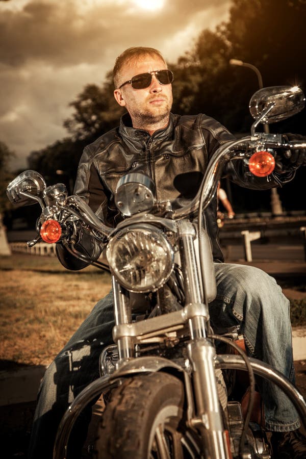Young Adult Biker Riding a Chopper Motorcycle Stock Image - Image of ...