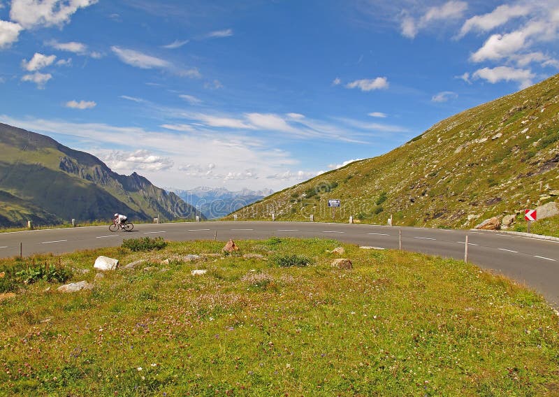 Biker on alpine road stock image. Image of panorama, bicycle - 22319511
