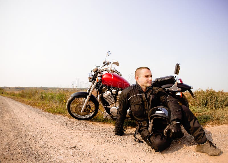 Biker on the country road stock photo. Image of life - 27990400