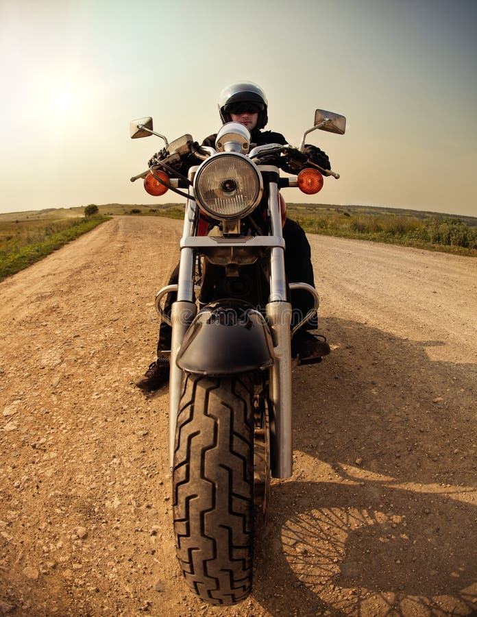 Biker on the country road stock photo. Image of field - 27990560