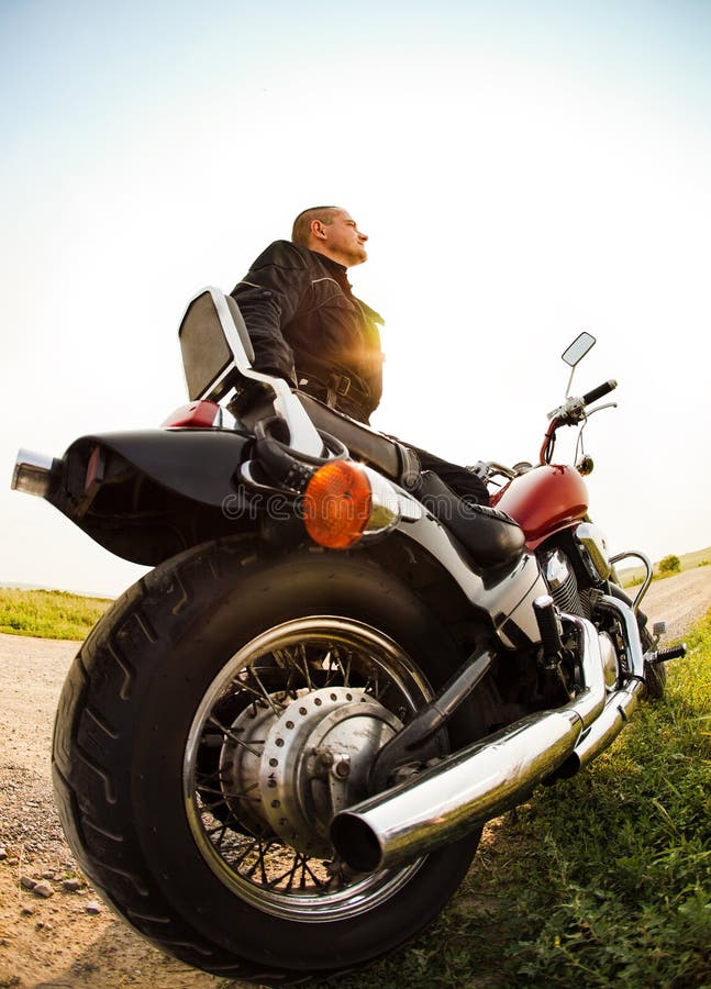 Biker on the country road stock image. Image of iron - 27991139